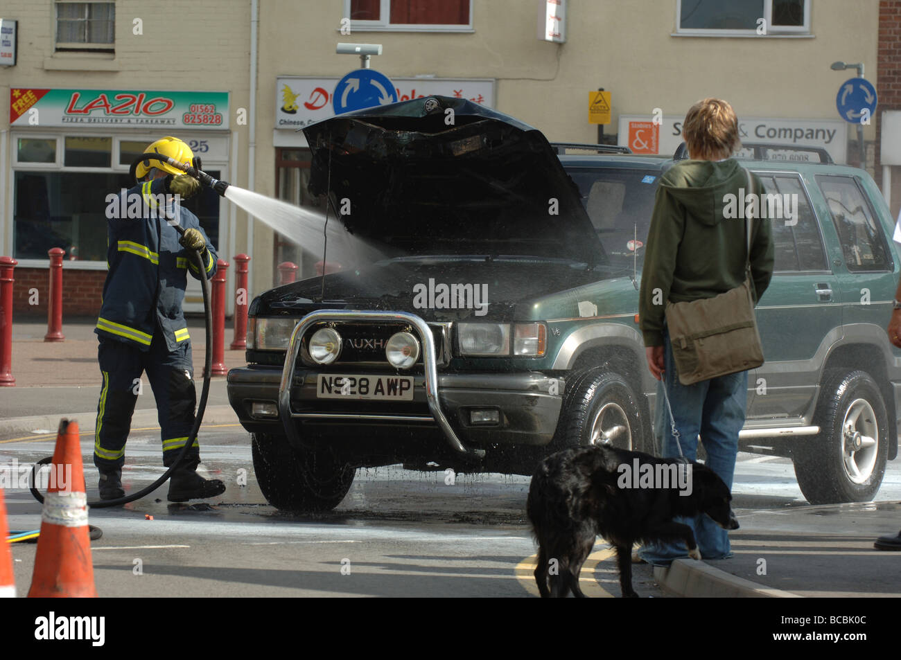 Vauxhall Frontera car fire being put out by fire service in West ...
