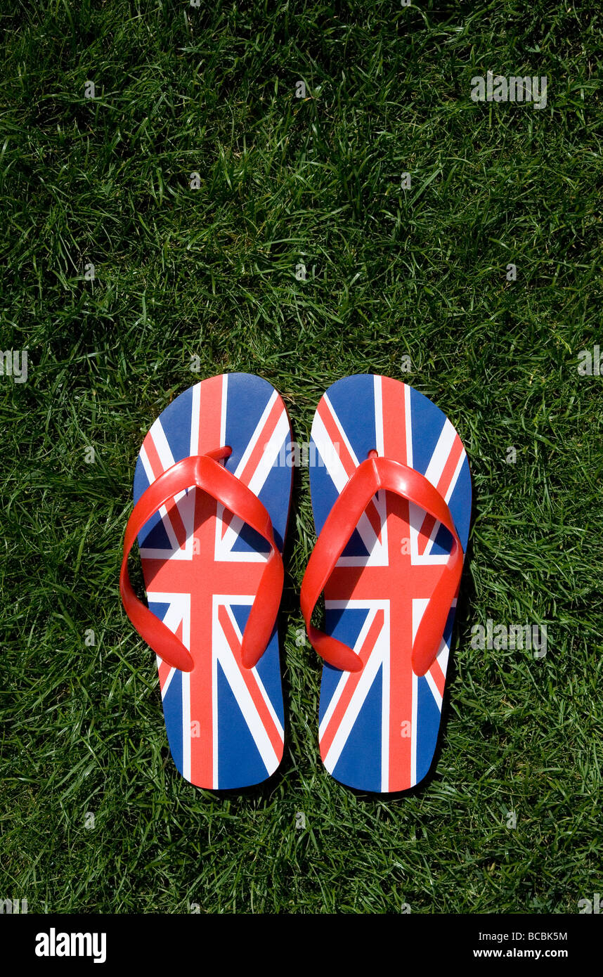 union jack flip-flops on grass Stock Photo - Alamy