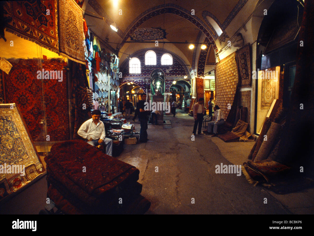 Istanbul Turkey Man Selling Carpets At Grand Bazaar Stock Photo - Alamy