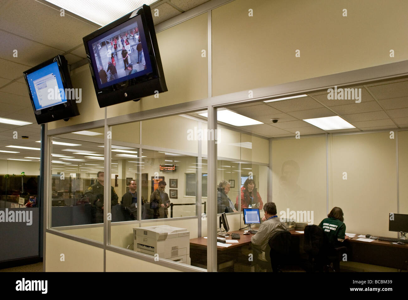On election night ballots are electronically tabulated in a secure room ...