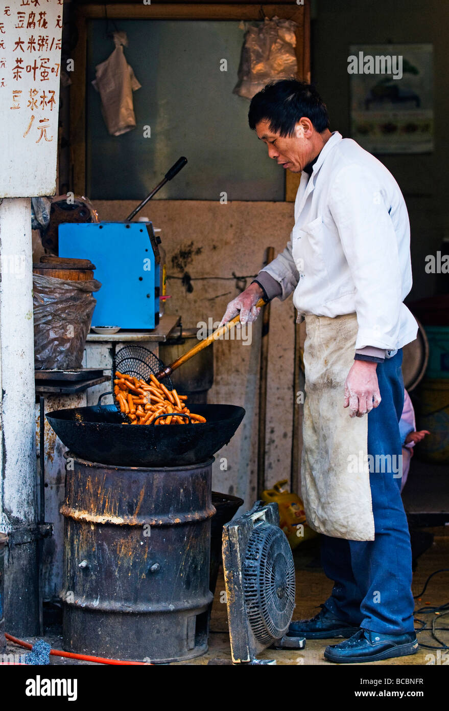 chinese cook in shanghai china Stock Photo - Alamy