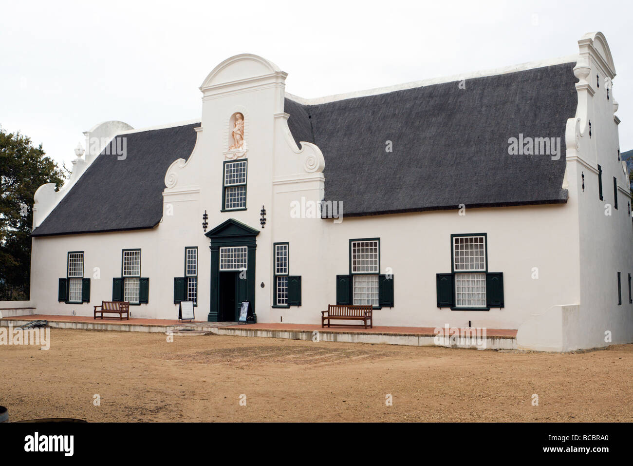 A traditional Cape Dutch homestead on a wine farm called ...