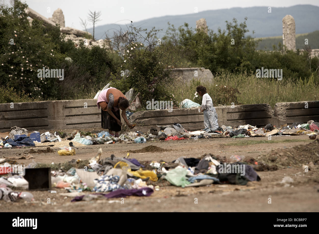 Adults and children scavenging for rubbish using a horse and cart ...