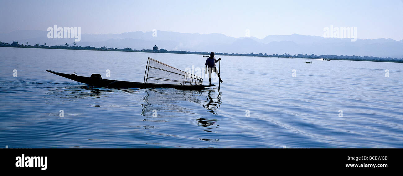 Myanmar (Burma), Shan State, Inle Lake, fisherman using a big conical ...