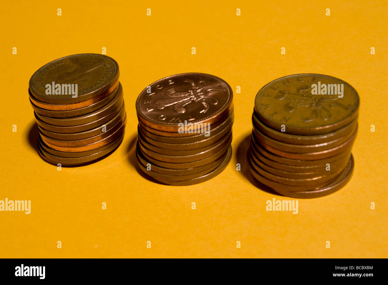 3 piles coins hi-res stock photography and images - Alamy