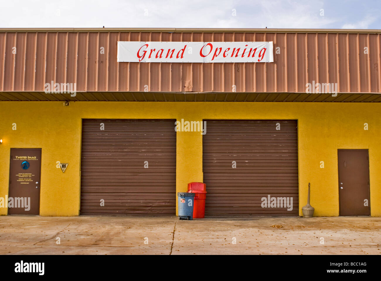 Industrial unit in Cocoa, Florida, with "Grand Opening" sign Stock ...