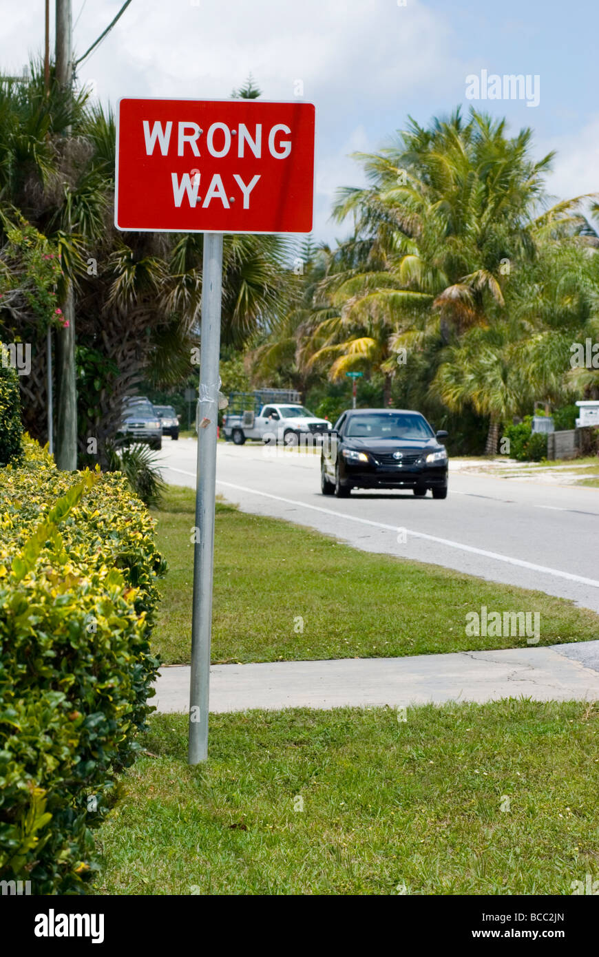 Wrong way road sign in Cocoa Beach, Florida Stock Photo - Alamy
