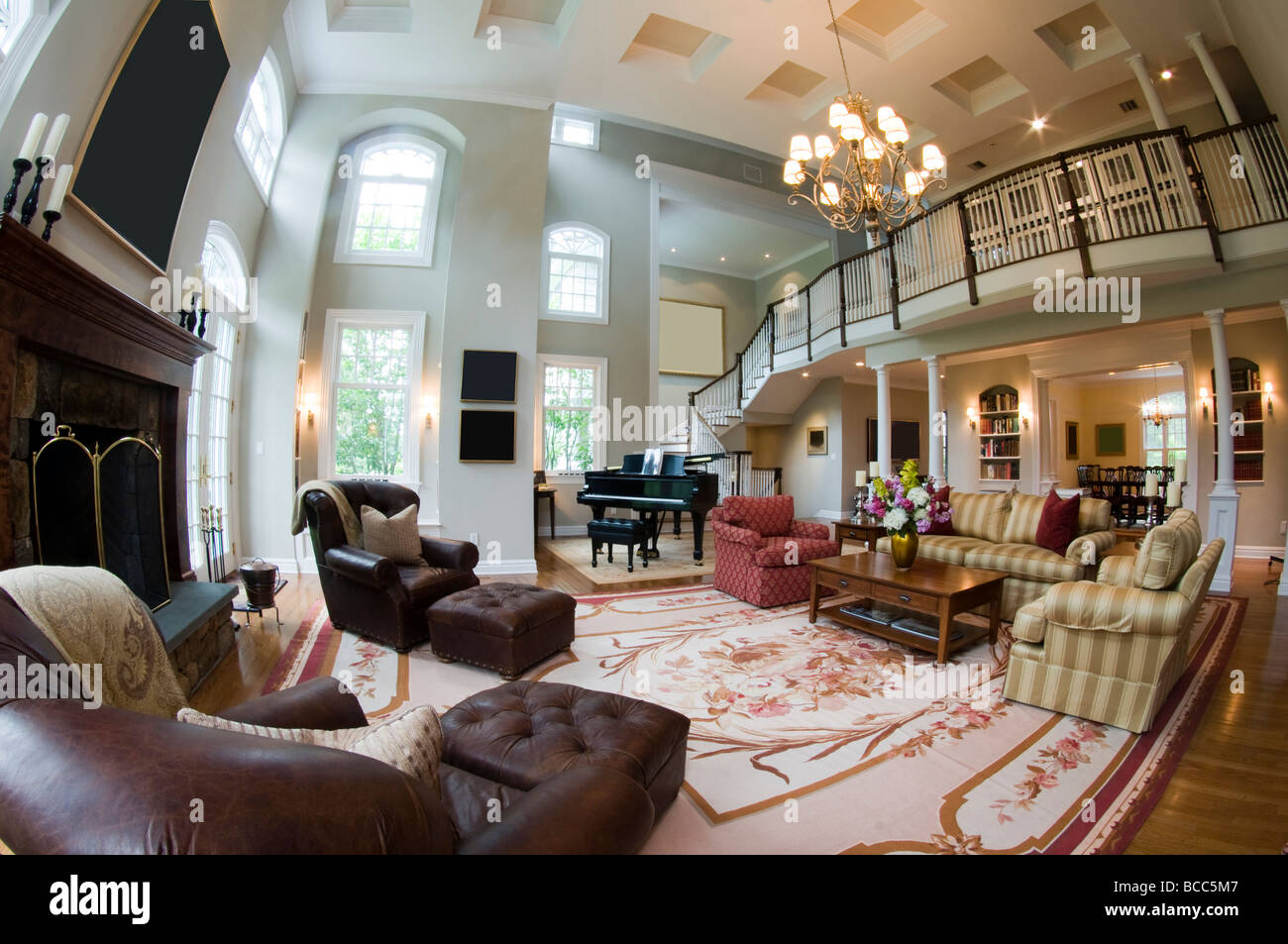 fish eye wide angle view of living room with fireplace and grand piano ...