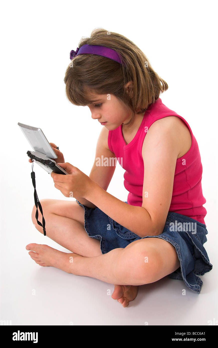 Young Girl Playing on a Nintendo DS Stock Photo - Alamy