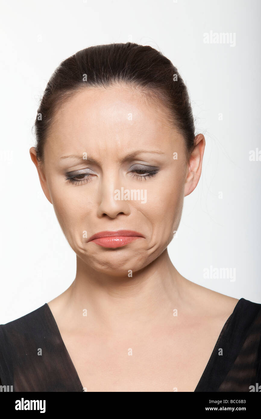 beautiful expressing sadness woman portrait on siolated background ...