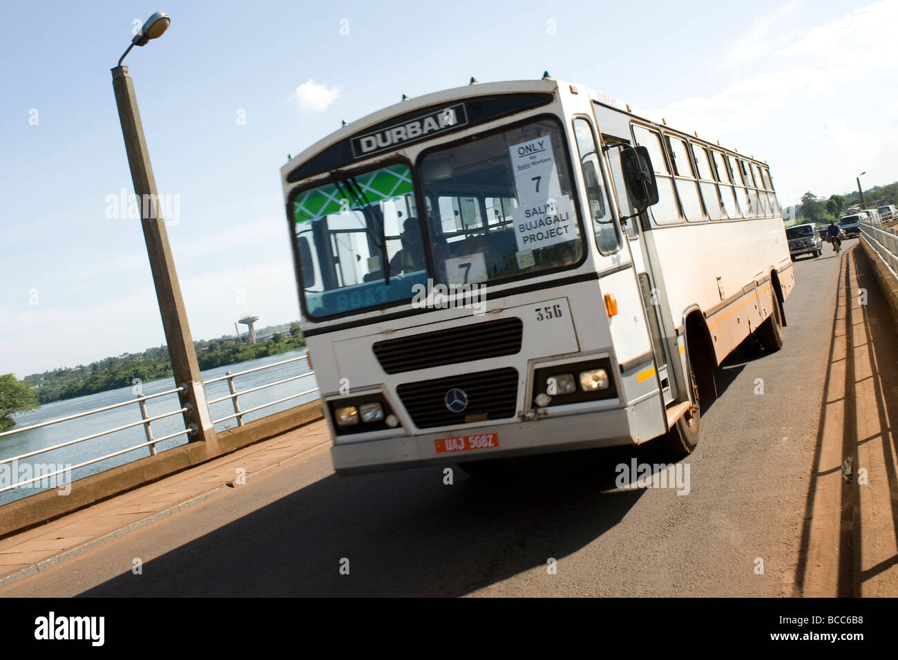 Bus on the Kampala Jinja road by Owen Falls Dam. Uganda Stock Photo - Alamy