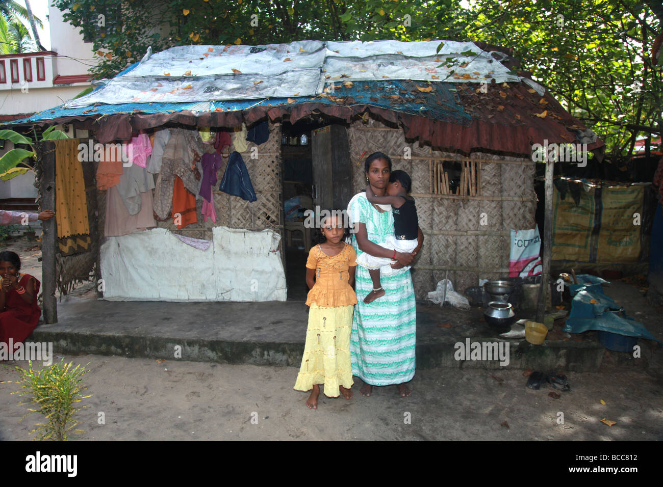 Family outside their home, Alappad Panchayat Kerala India Stock Photo ...