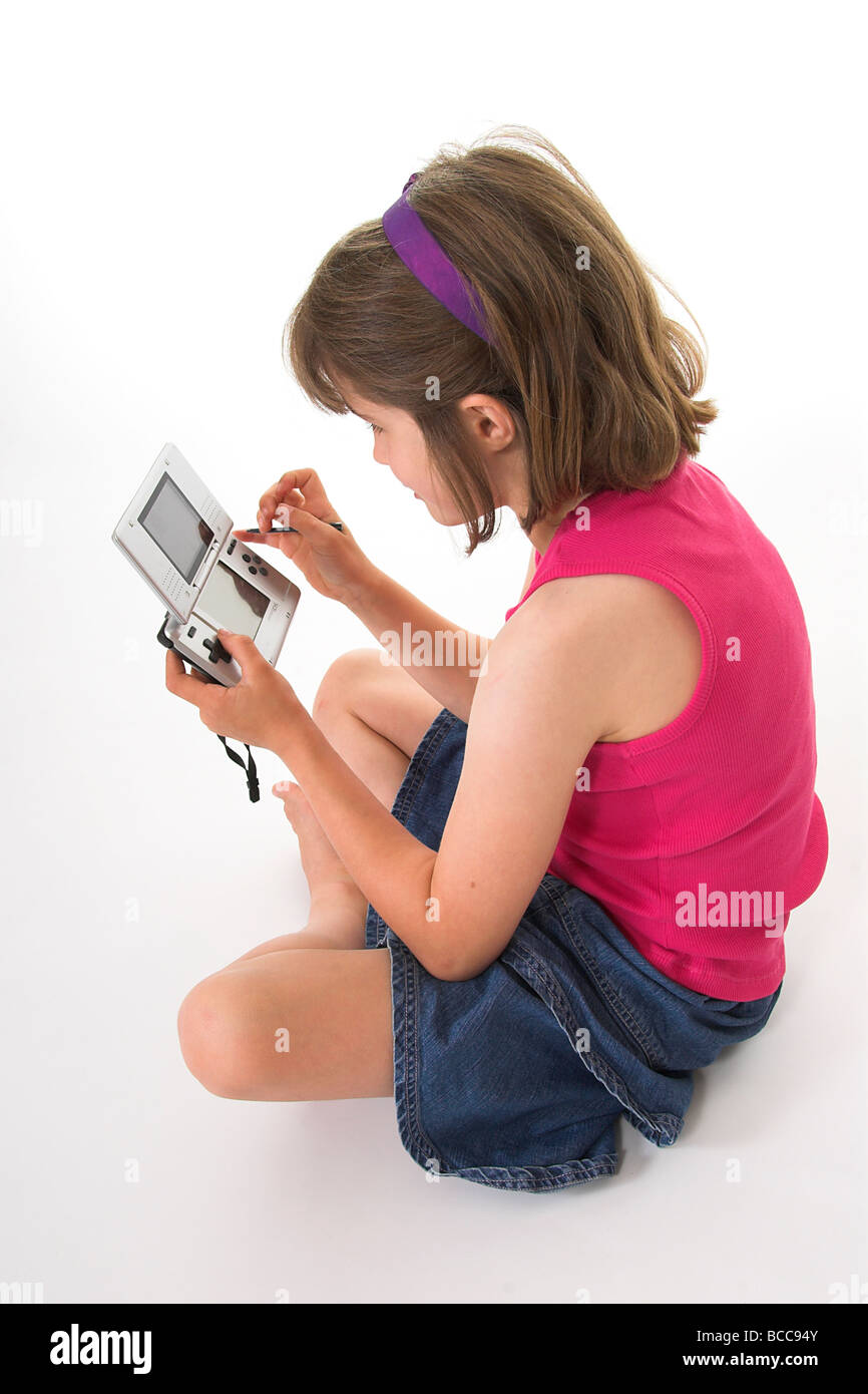 Young Girl Playing on a Nintendo DS Stock Photo - Alamy