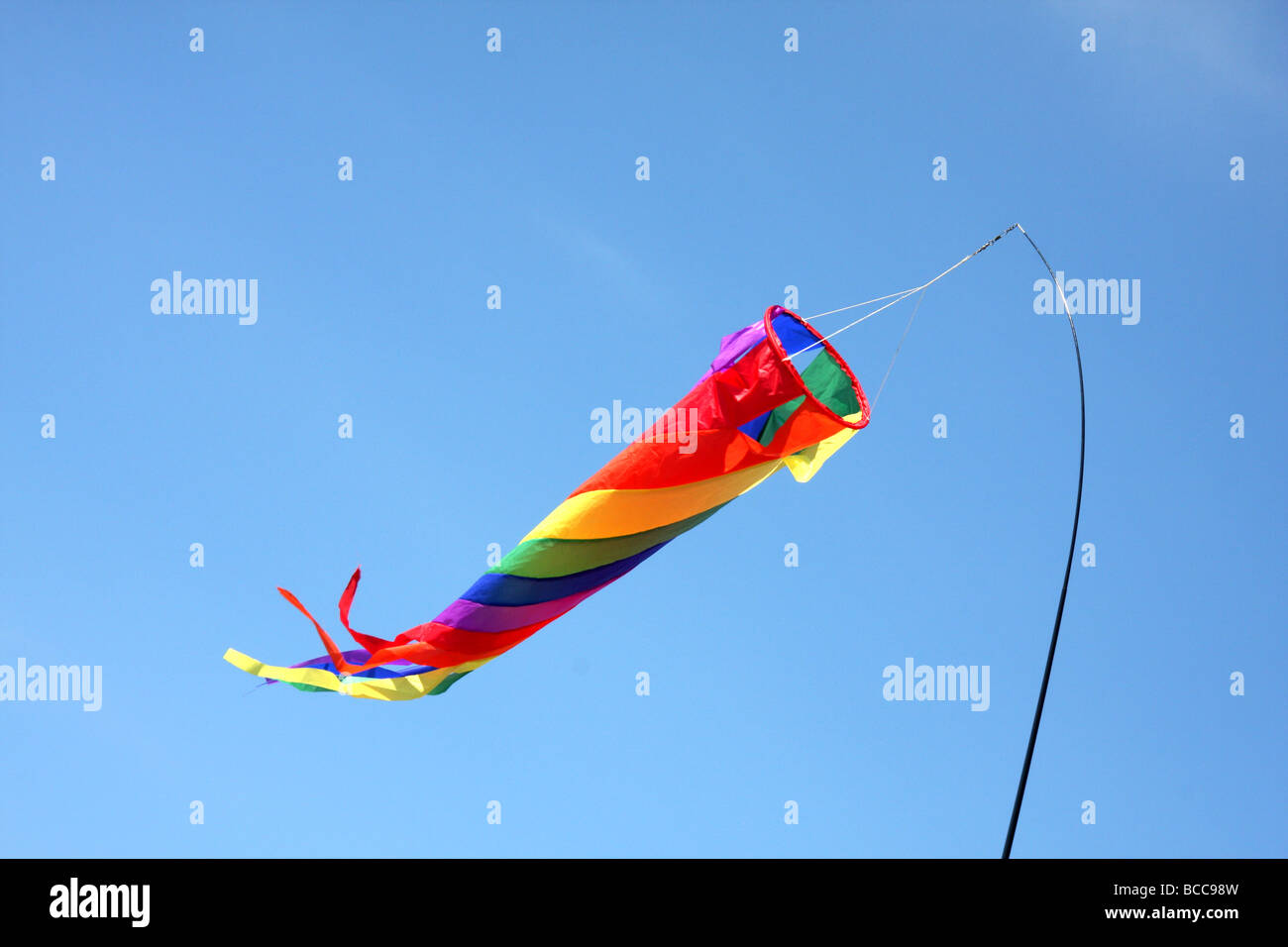 Colourful windsock against blue sky, Swanage, Dorset Stock Photo - Alamy