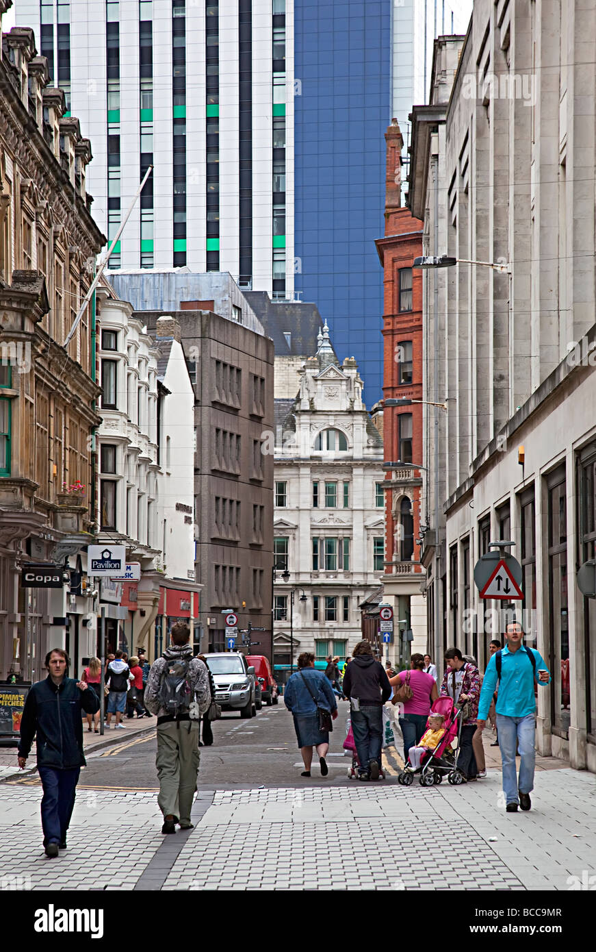 People in street with old and new architecture Cardiff Wales UK Stock ...