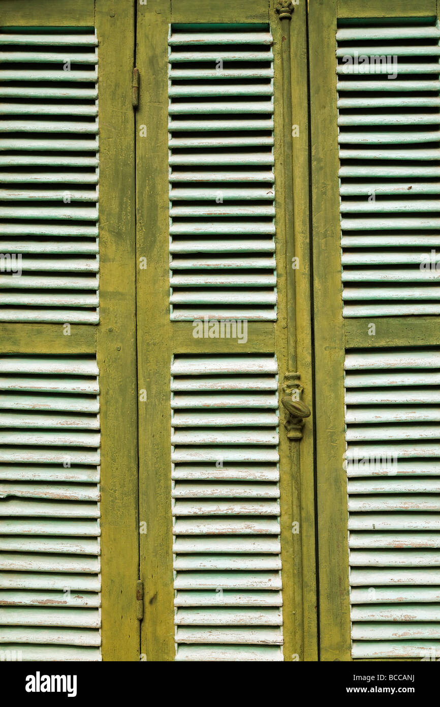 Old colonial window shutters on a building in the Ho Chi Minh Mausoleum ...