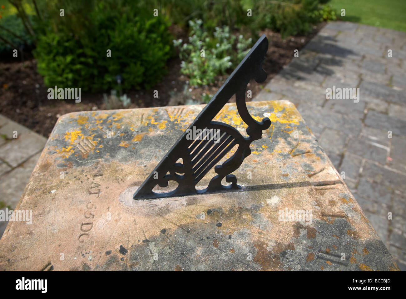 sundial showing 12 noon in the walled garden at Glenarm castle county ...