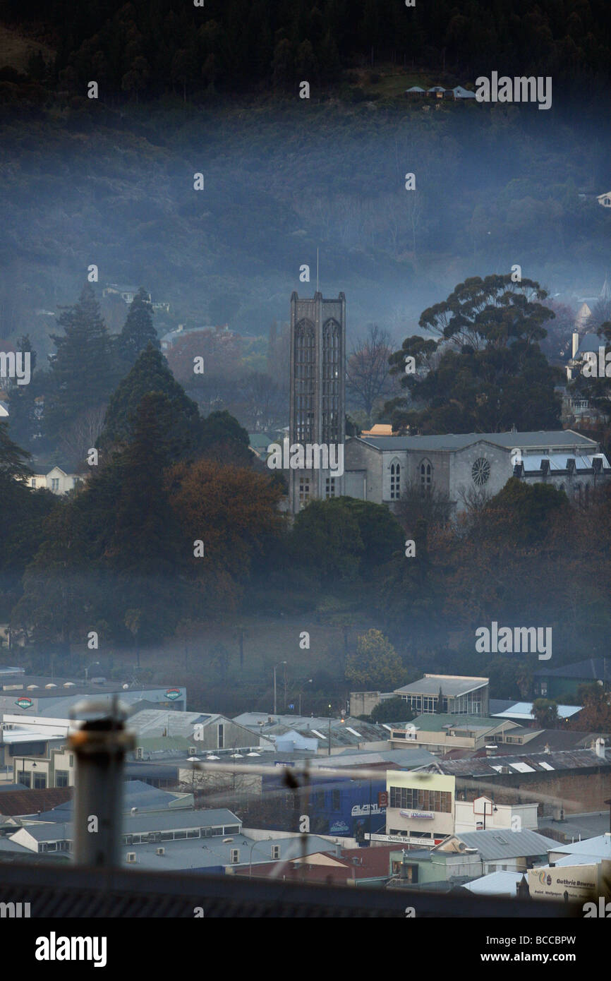 A pall of smog lies over the centre of Nelson, New Zealand, early in ...