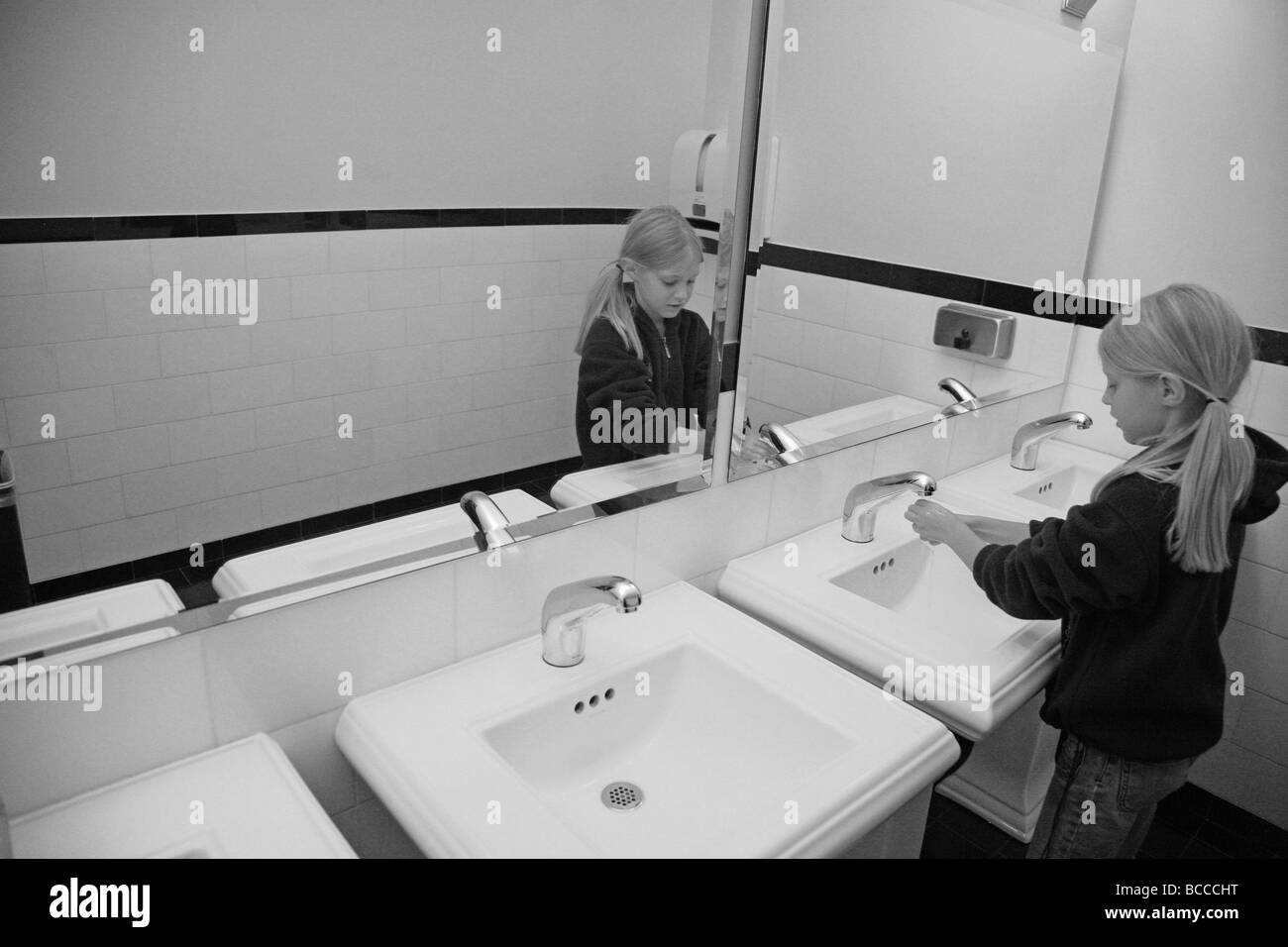 Black child washing hands Black and White Stock Photos & Images - Alamy