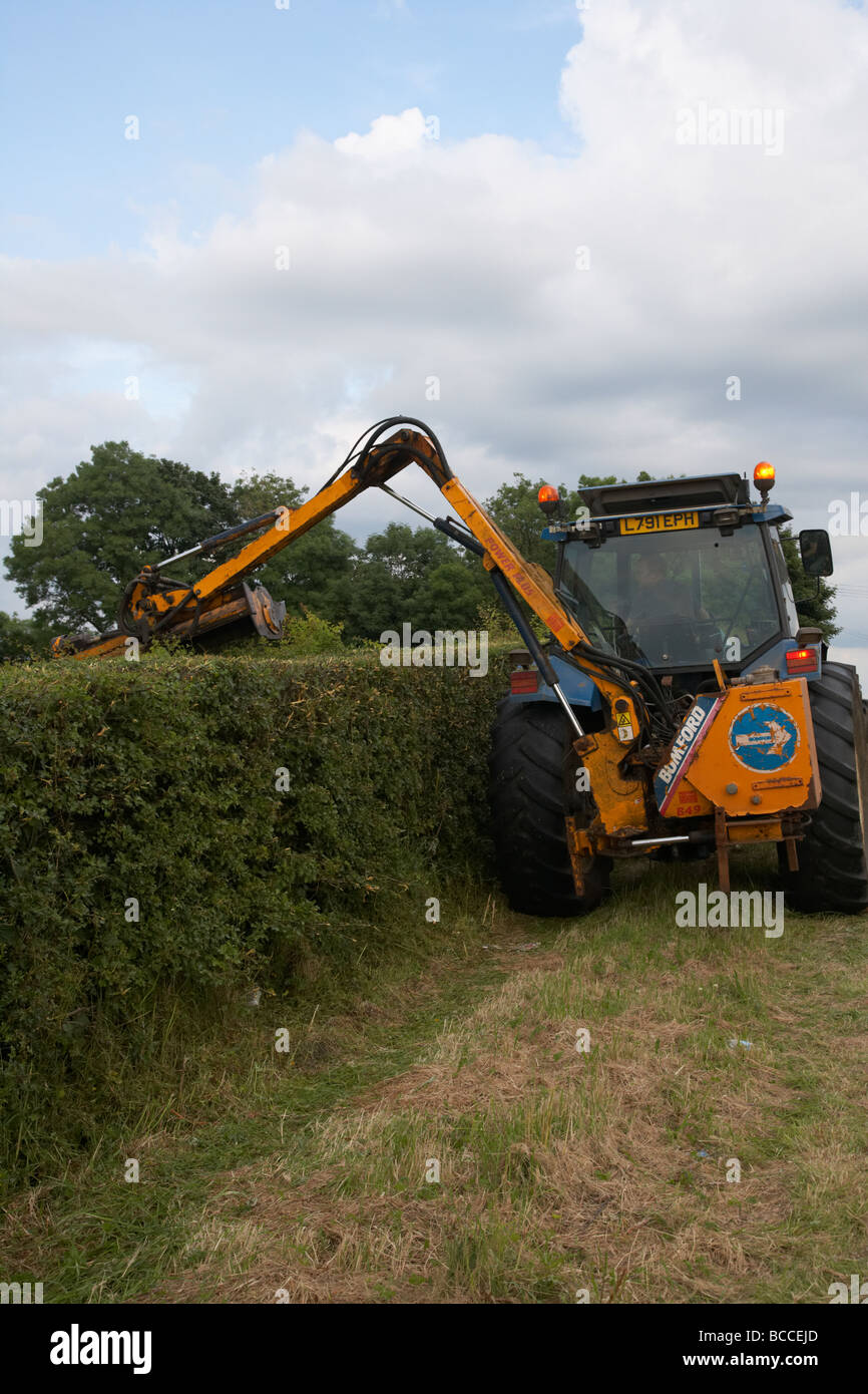 tractor trimming pruning and cutting roadside hedges county antrim ...