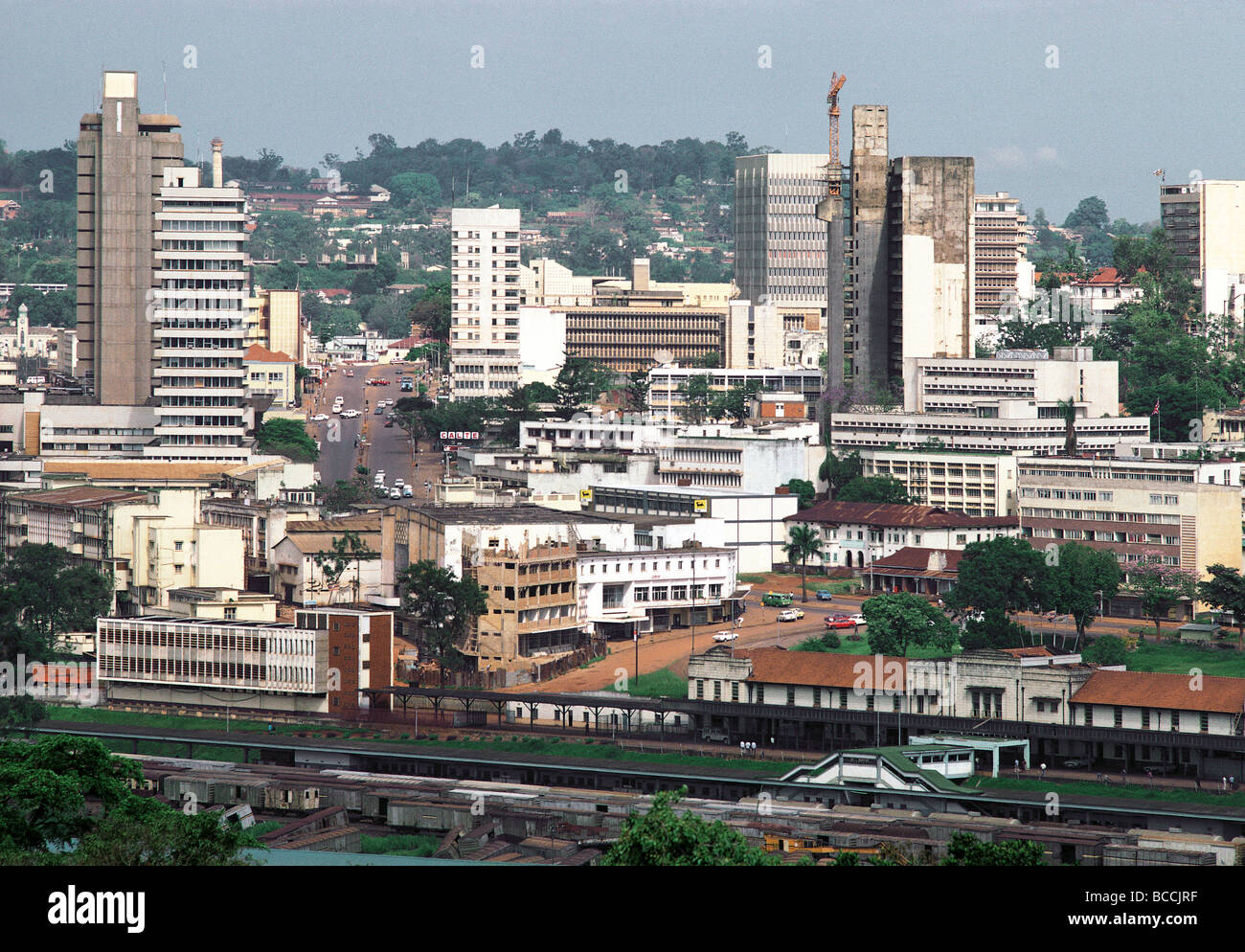 Railway station and modern tall high rise buildings office blocks shops ...