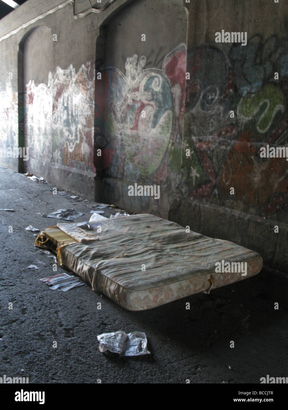 bed of homeless man person under bridge Stock Photo - Alamy