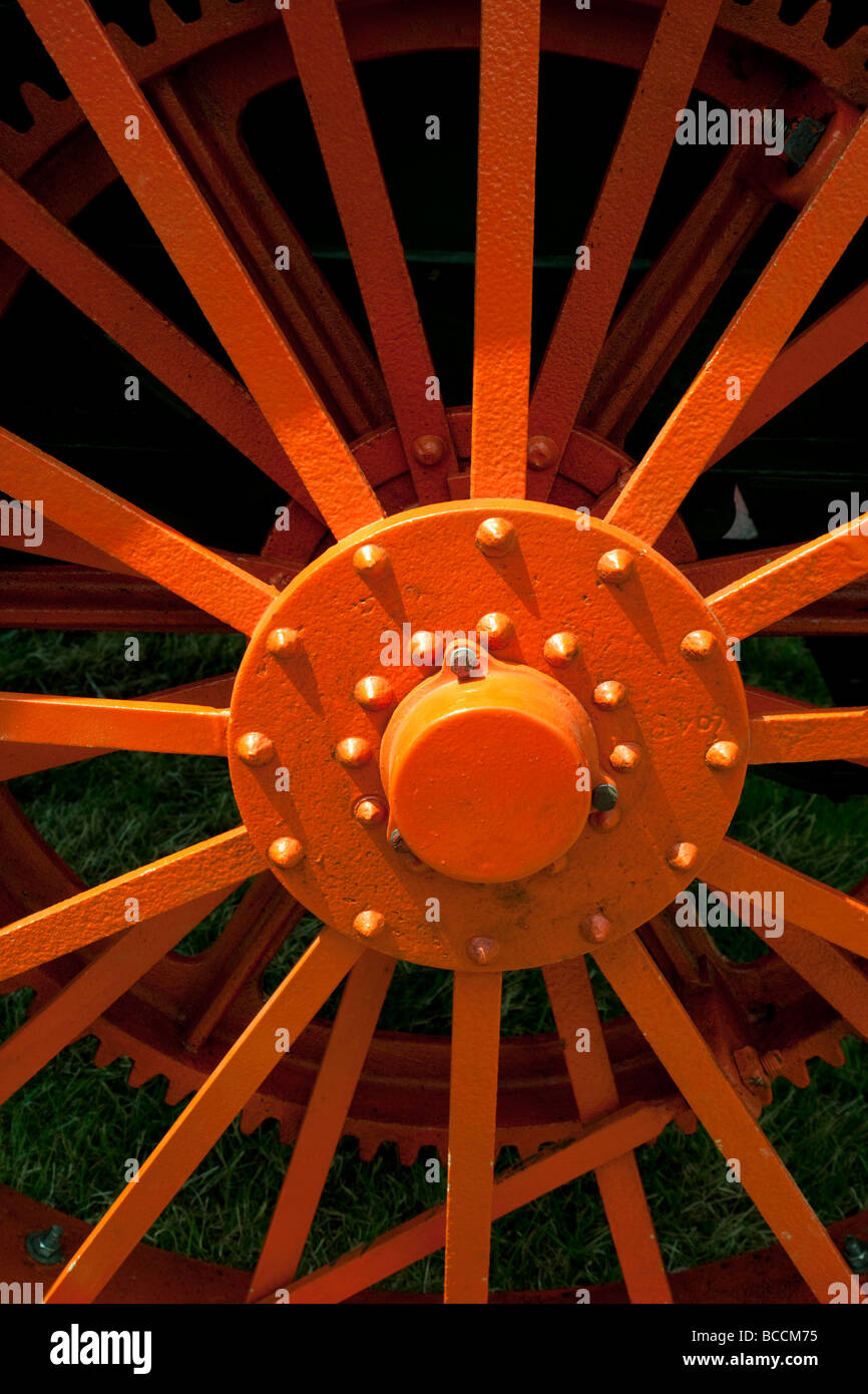 Orange tractor wheel Stock Photo - Alamy