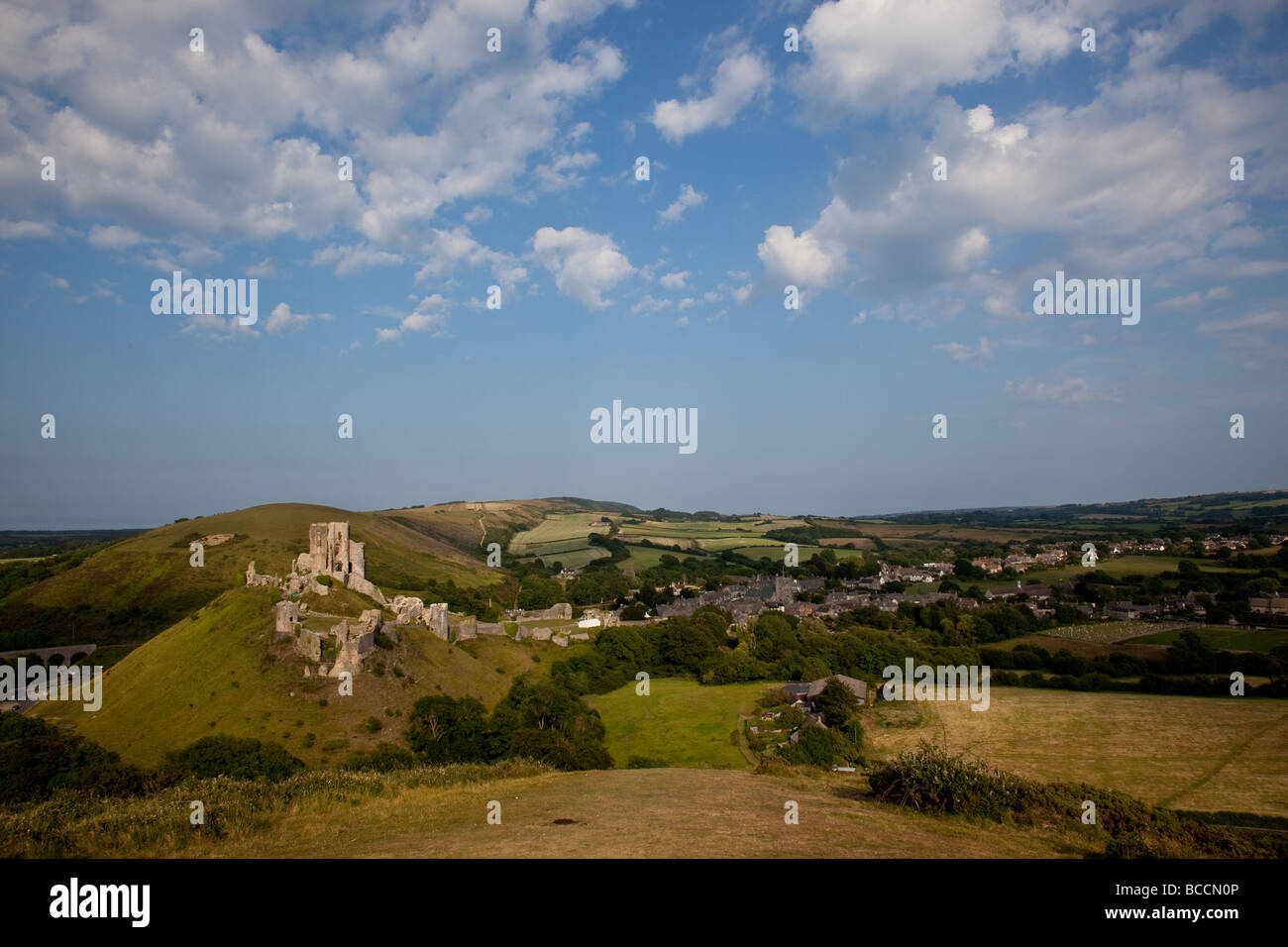 Corfe Castle as seen from the Purbeck Way footpath on the Purbeck Hills ...