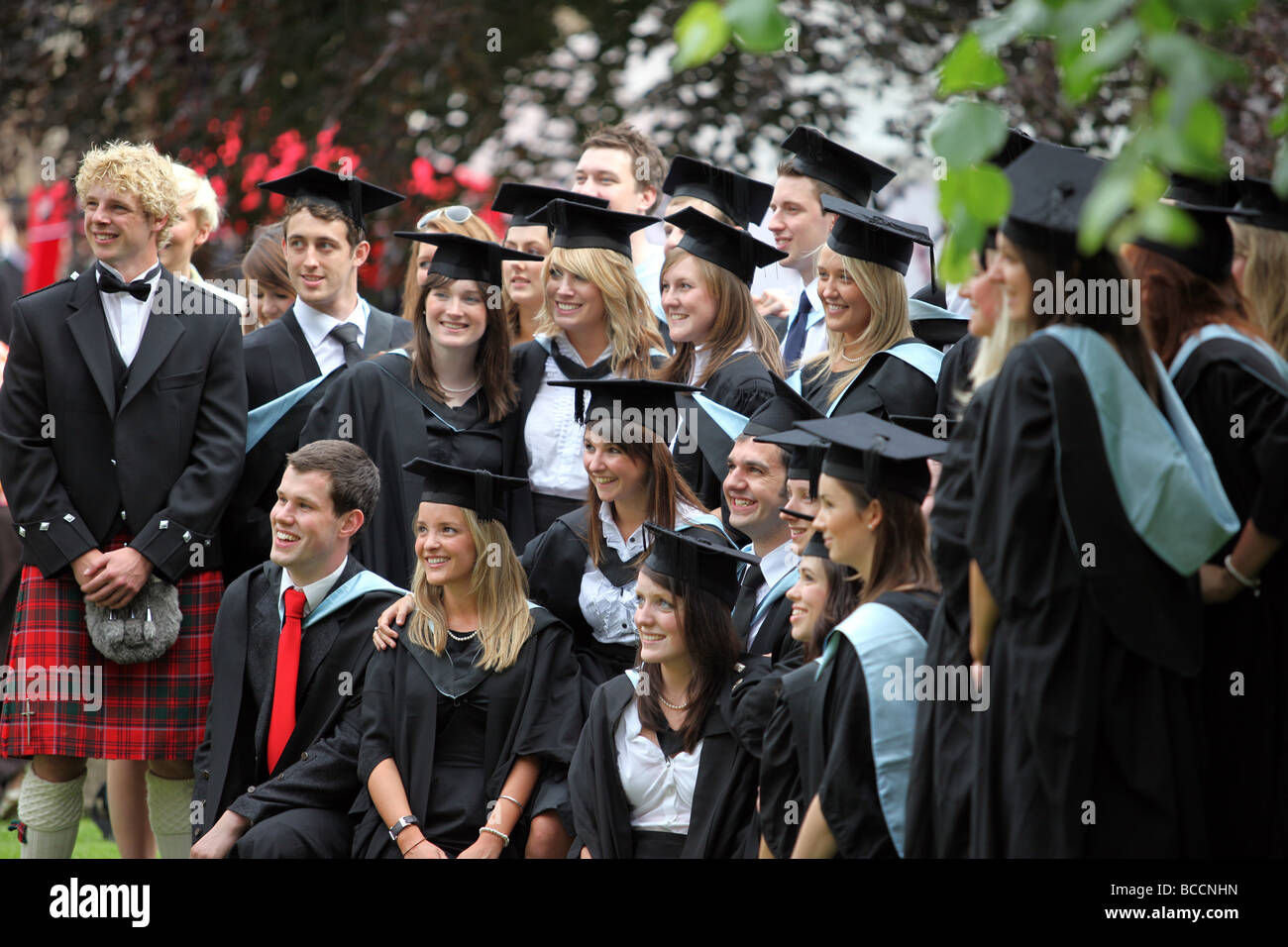 Graduating students wearing gowns and mortar boards at the University ...