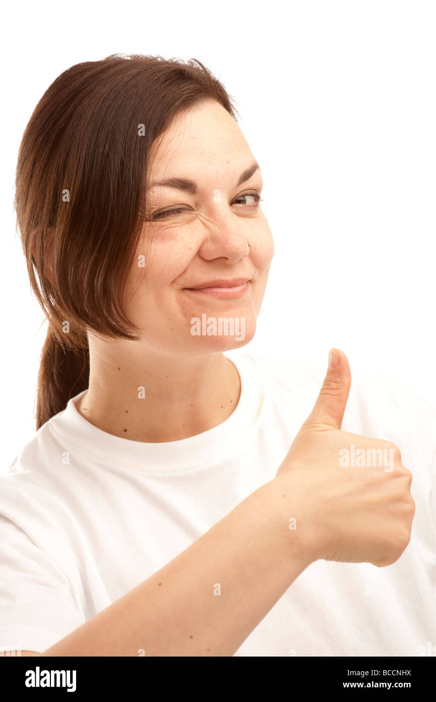 happy positive confident young woman wearing white t-shirt winking and ...