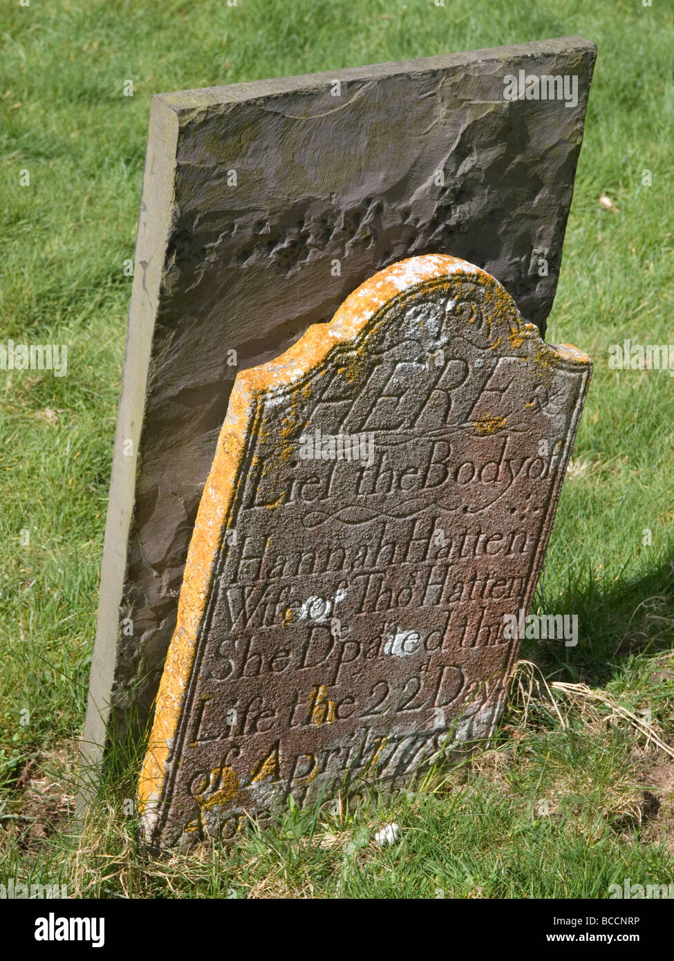 Two stone headstones side by side in a church yard, England UK Stock ...