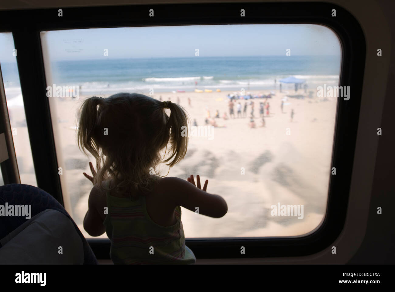 A baby girl on the Amtrak Surfliner enjoys the view Stock Photo - Alamy