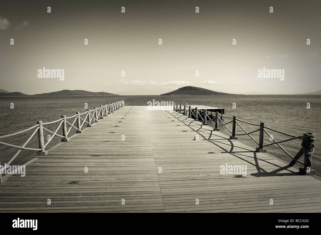 wooden wharf and empty beach at the winter Stock Photo - Alamy
