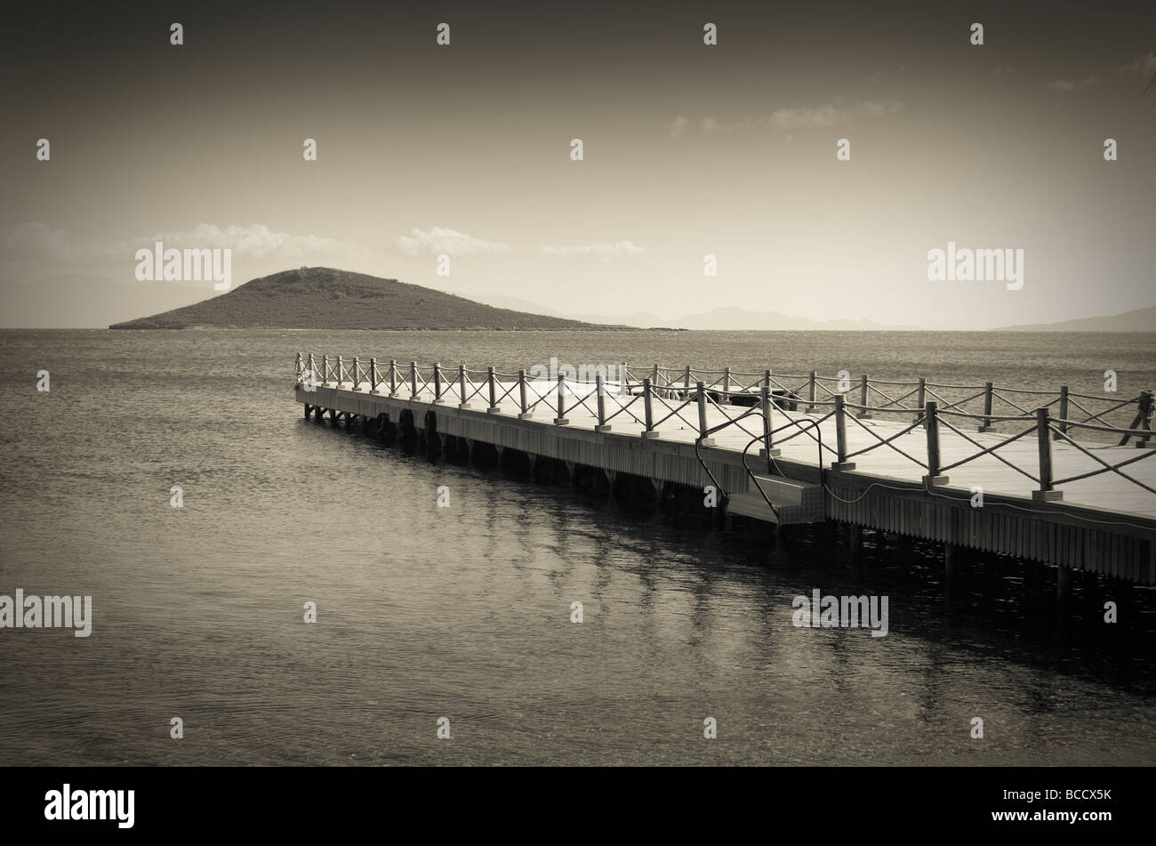 wooden wharf and empty beach at the winter Stock Photo - Alamy