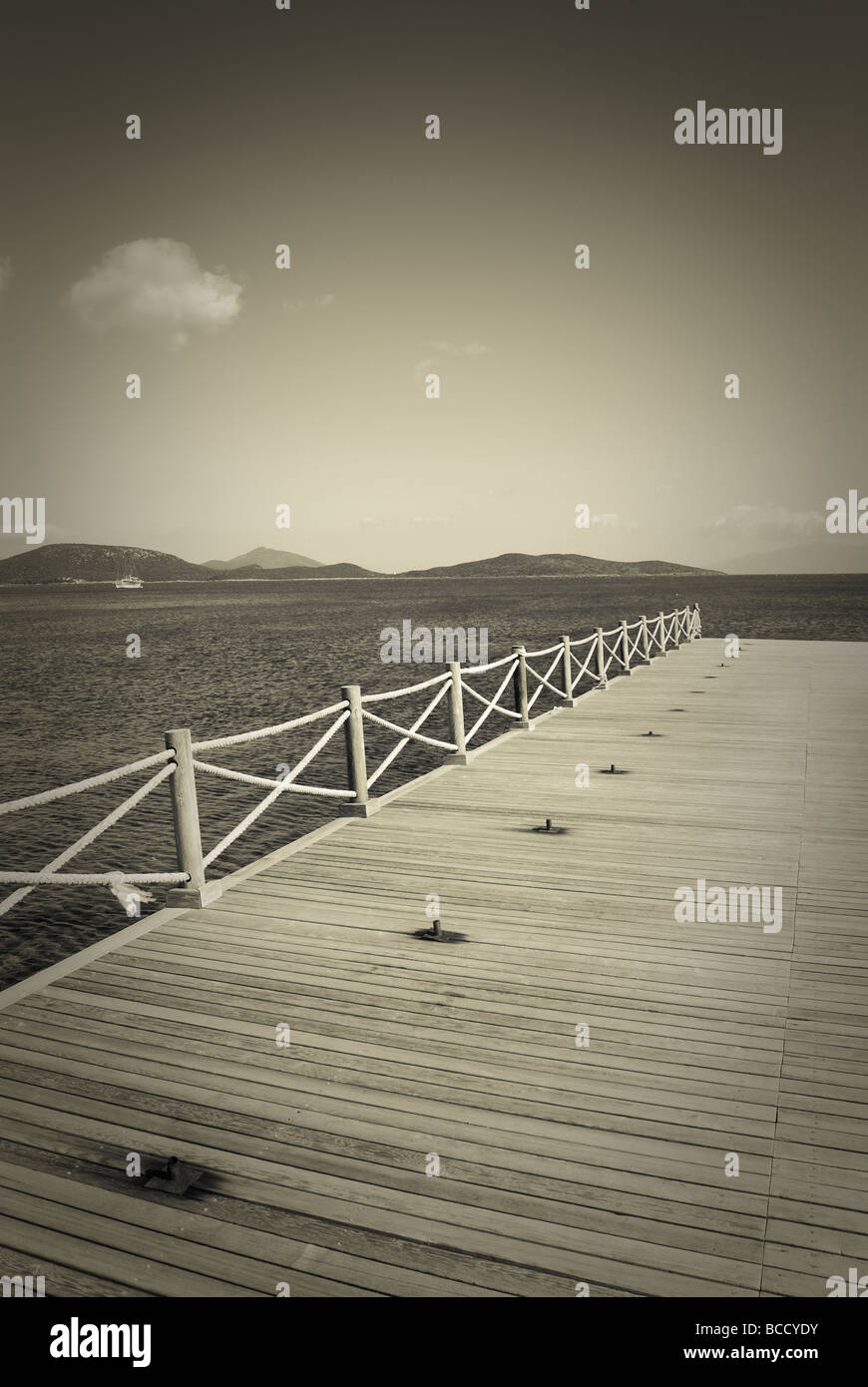 wooden wharf and empty beach at the winter Stock Photo - Alamy