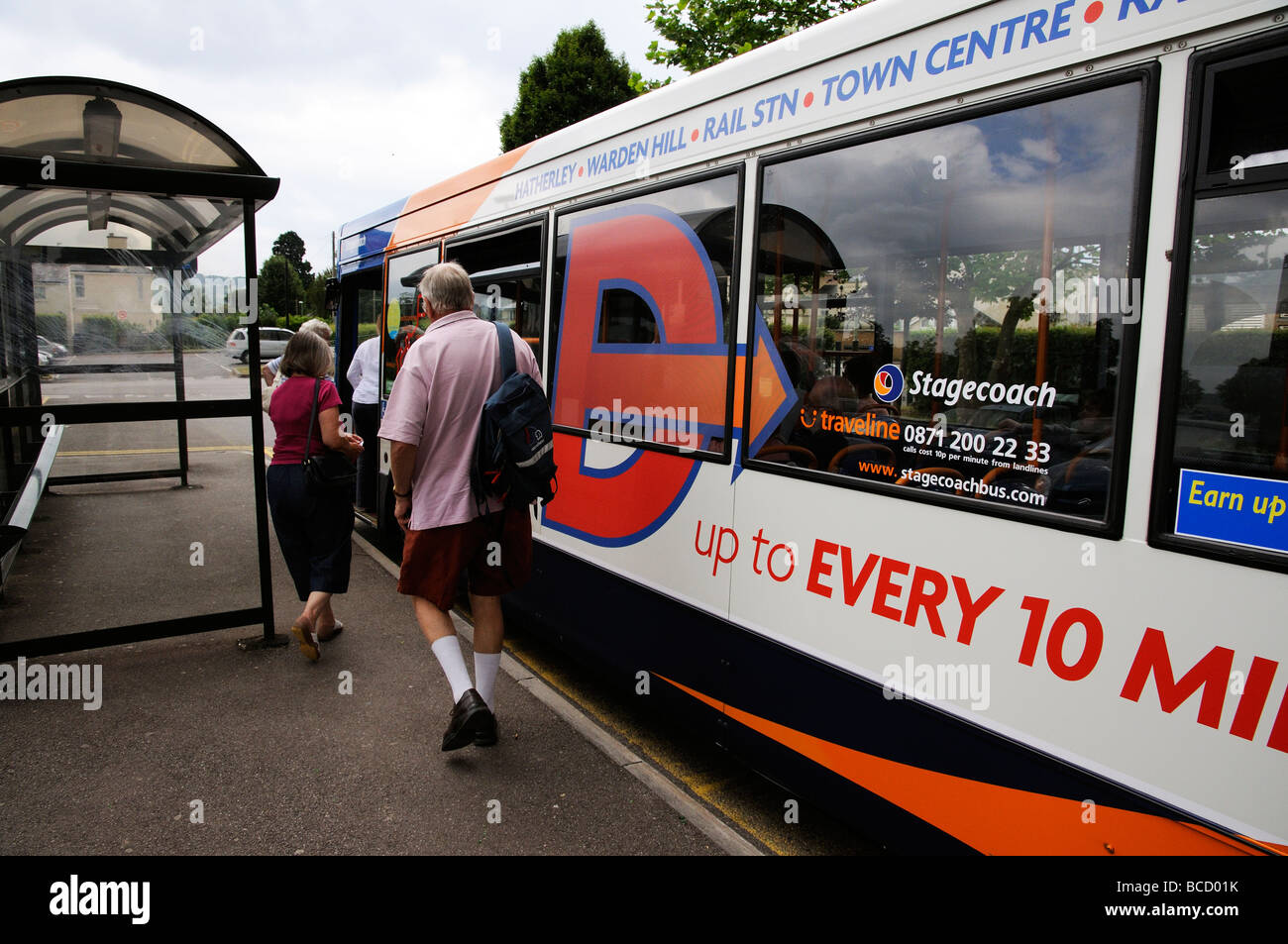 Passengers boarding a Stagecoach operated bus in Cheltenham ...