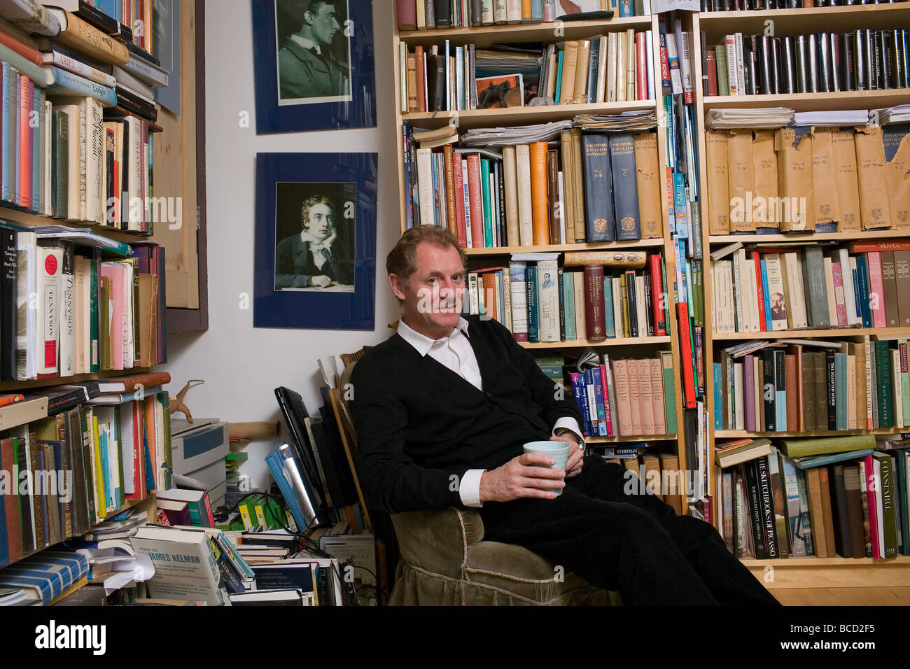 Poet Andrew Motion sat in the study where he works at his North London ...