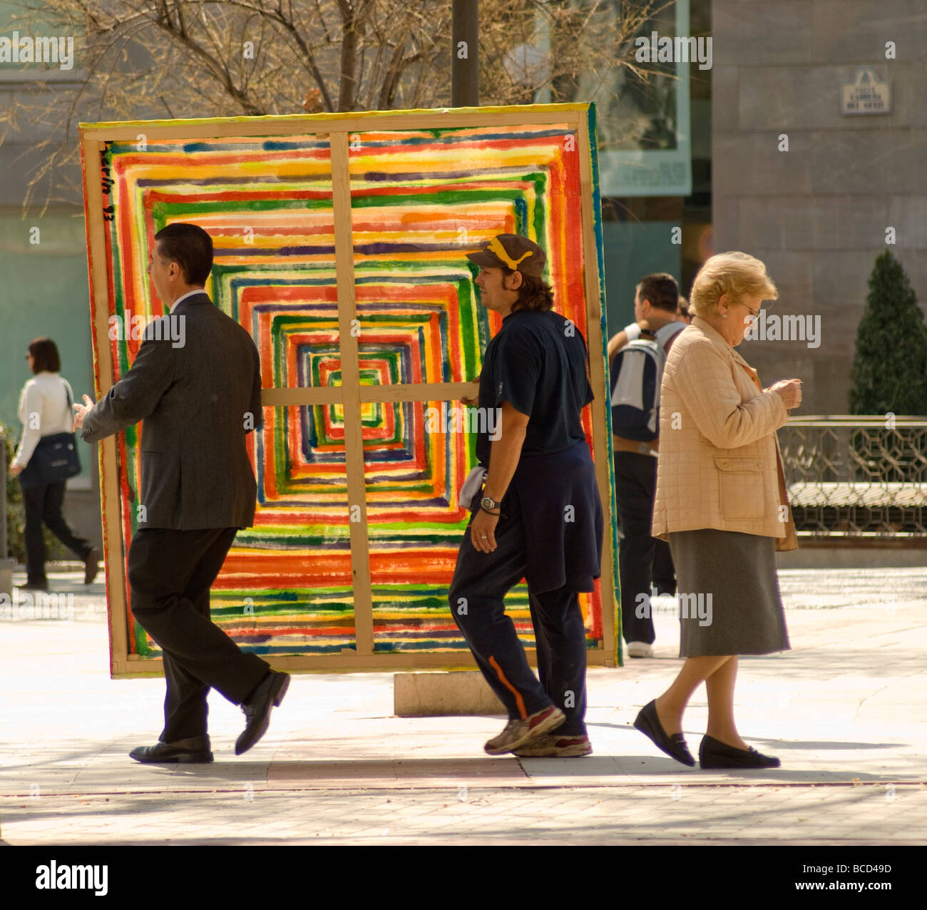 People go about their daily business in the main square of the Spanish ...