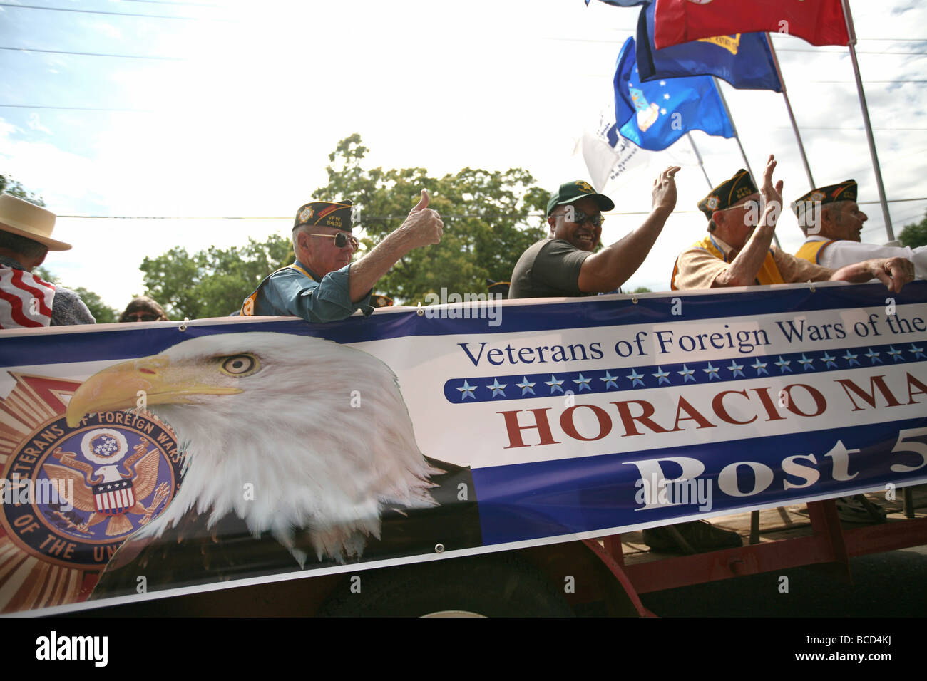 Veterans riding on truck in 4th of July parade Stock Photo - Alamy