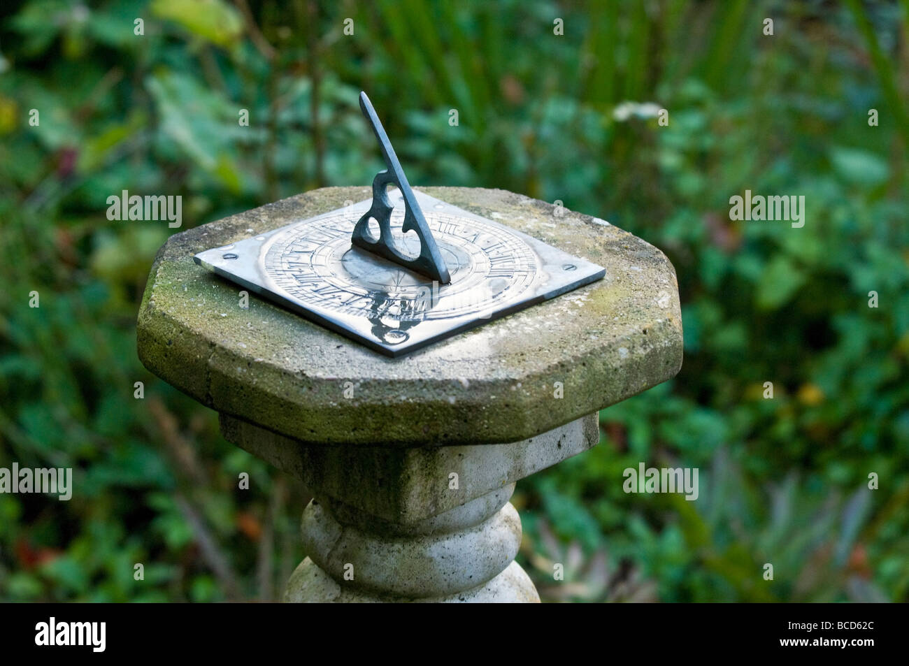 detail of a sundial in an English country garden Stock Photo - Alamy