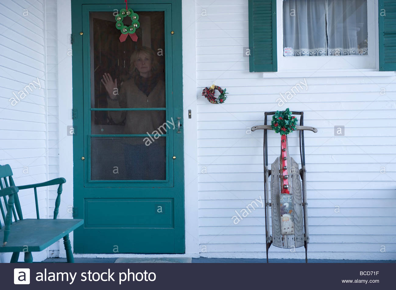 Woman Front Door House Back Stock Photos & Woman Front Door House Back ...