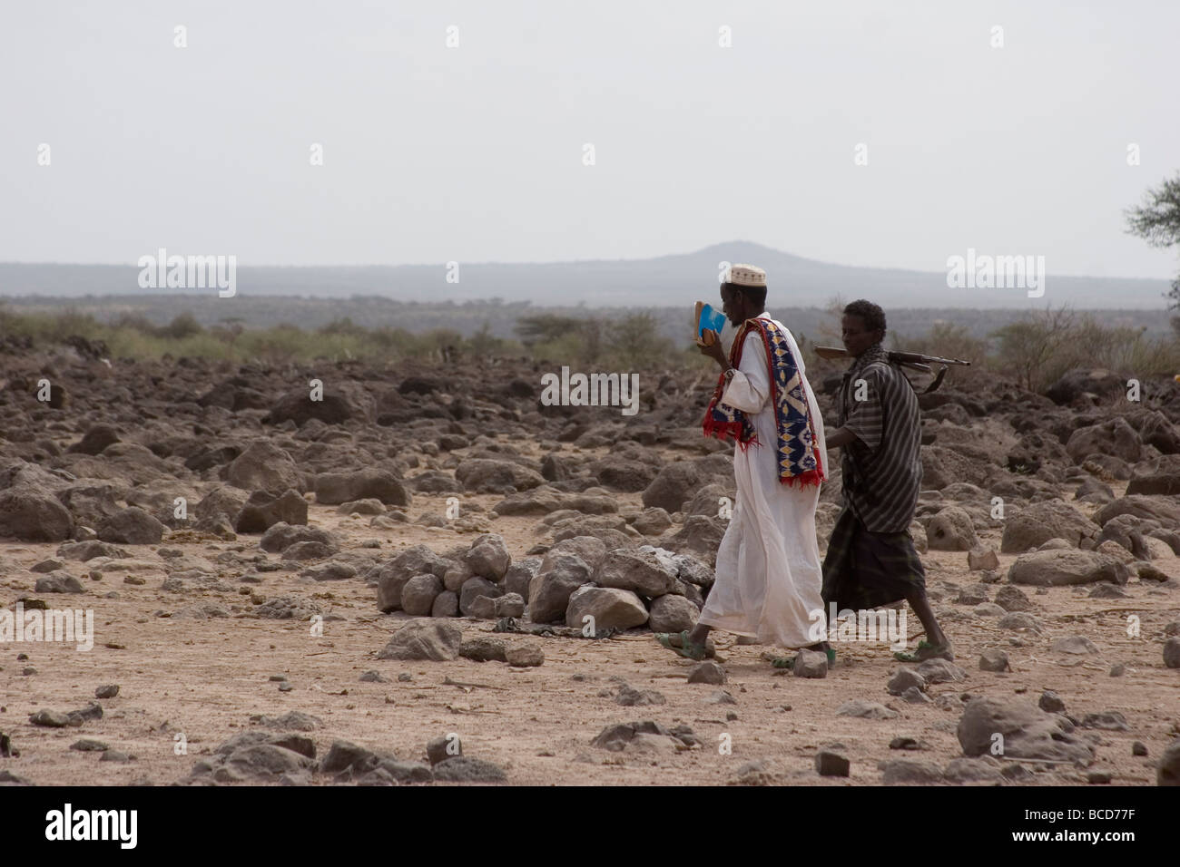 Dubti, Afar region, Ethiopia -- Young Afar man walking home with the ...