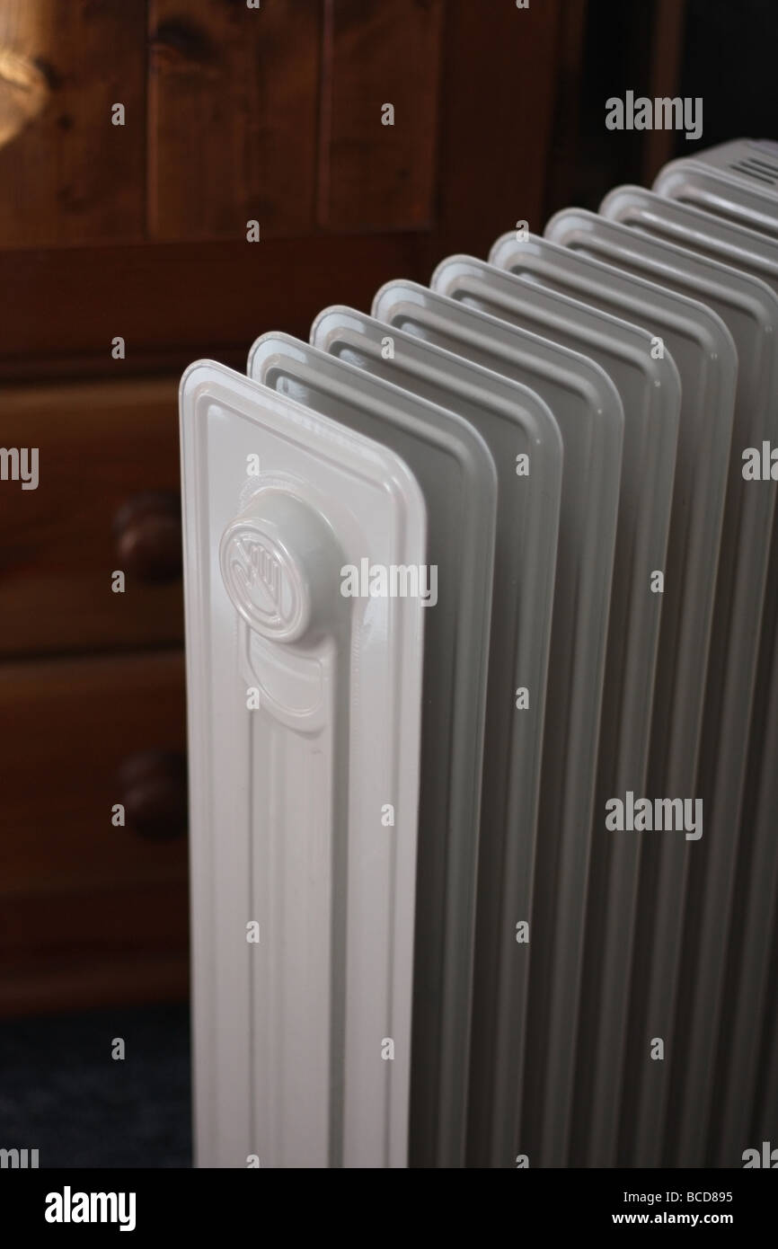 A portable radiator in the home which is electric Stock Photo - Alamy