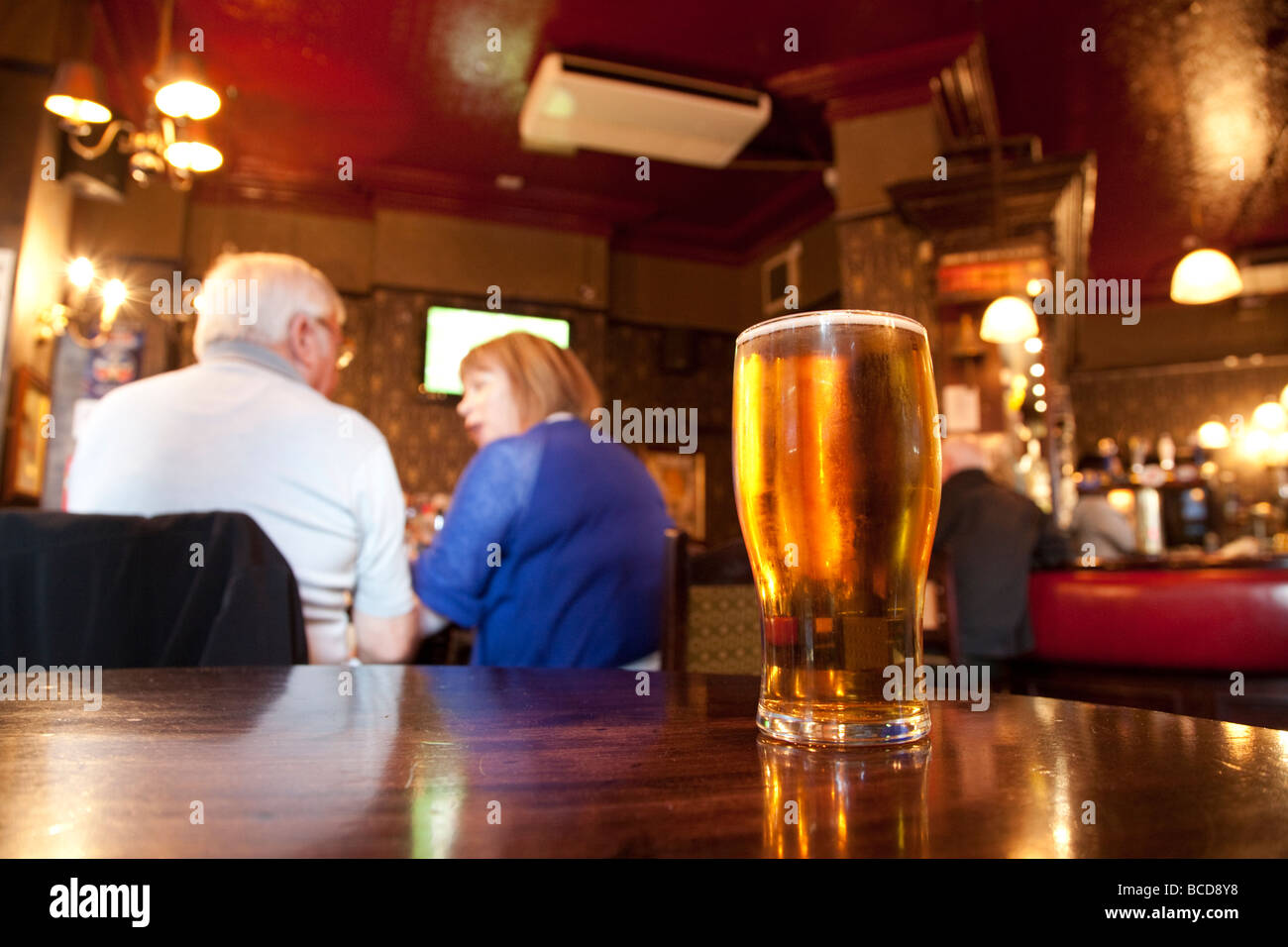 Pint of lager in pub Stock Photo - Alamy