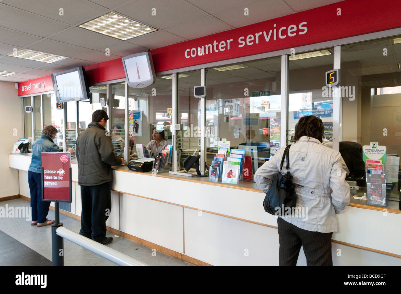 Post Office counter London England UK Stock Photo - Alamy