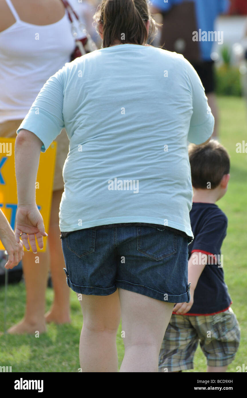 Fat woman obesity obese overweight walking shorts rear back view hi-res ...