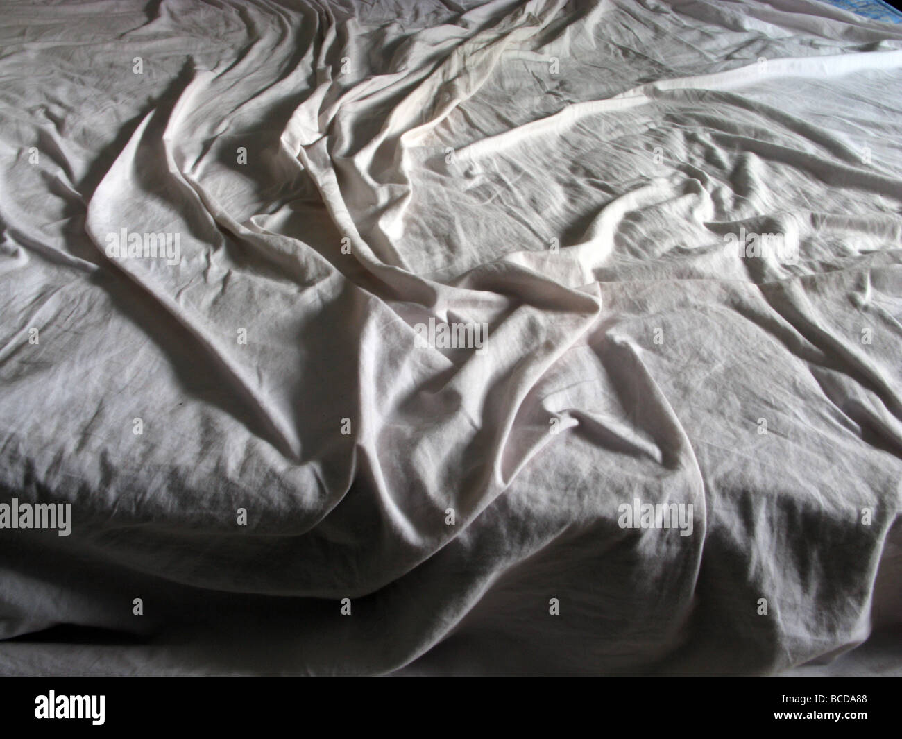 creases on bed sheet in dark room Stock Photo - Alamy