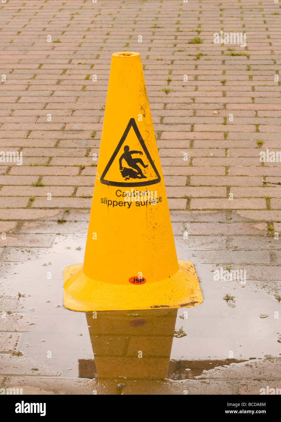 slippery surface safety cone Stock Photo - Alamy