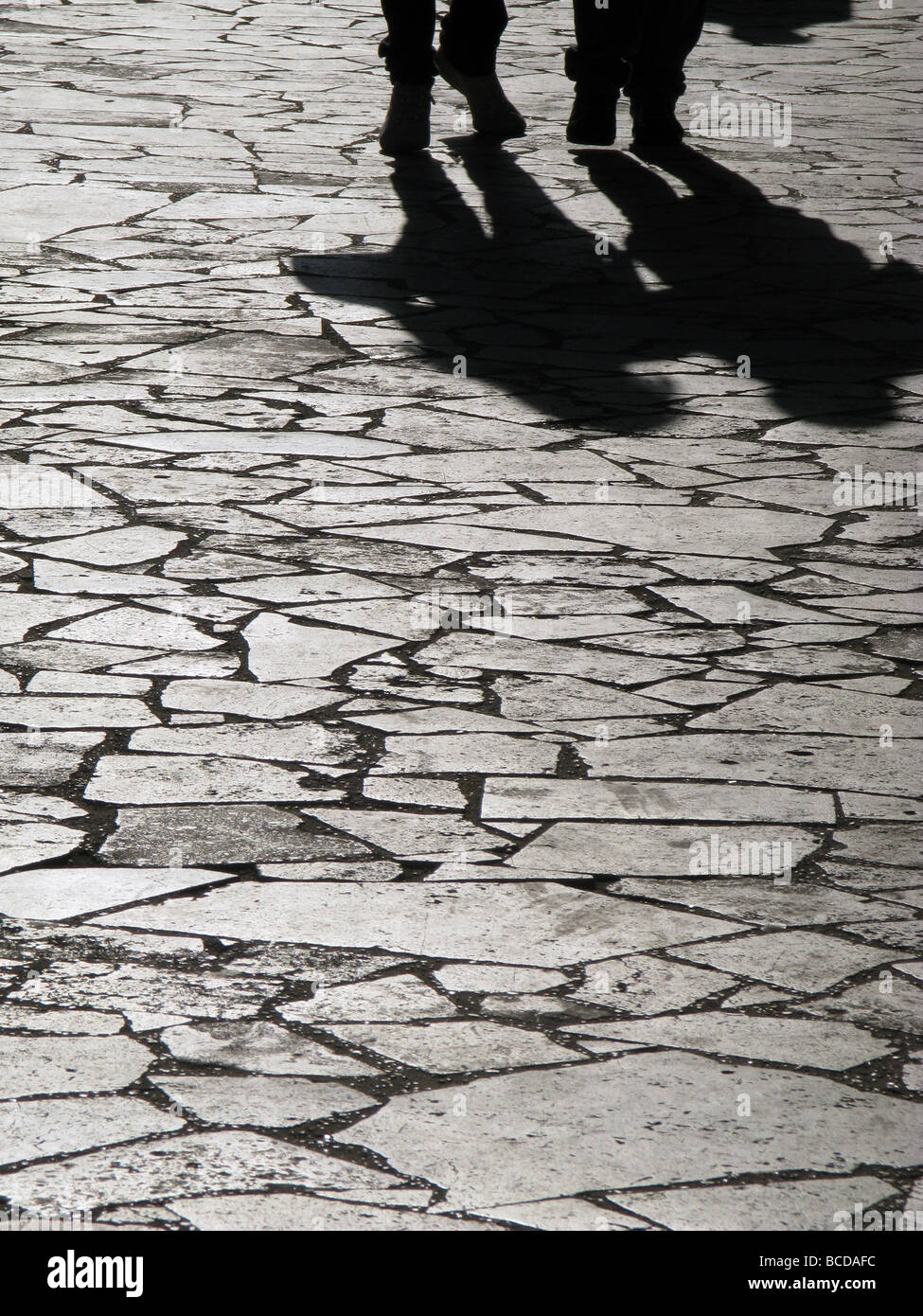 Couple shadow walking alone hi-res stock photography and images - Alamy