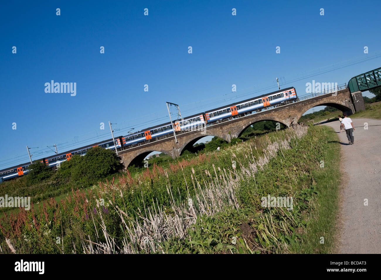 Train going over arches. Walthamstow marshes, Lee Valley regional park ...